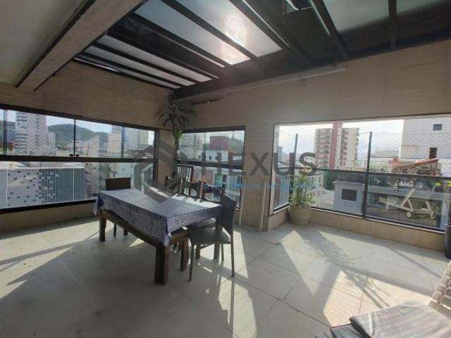 Cobertura duplex com varanda e vista livre na Praia das Asturias, Guaruja