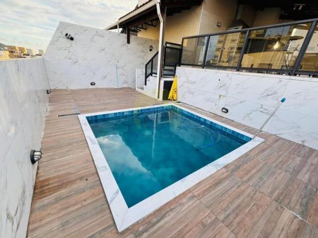 Cobertura localizado a quatro quadras da Praia da Enseada, em área privilegiada