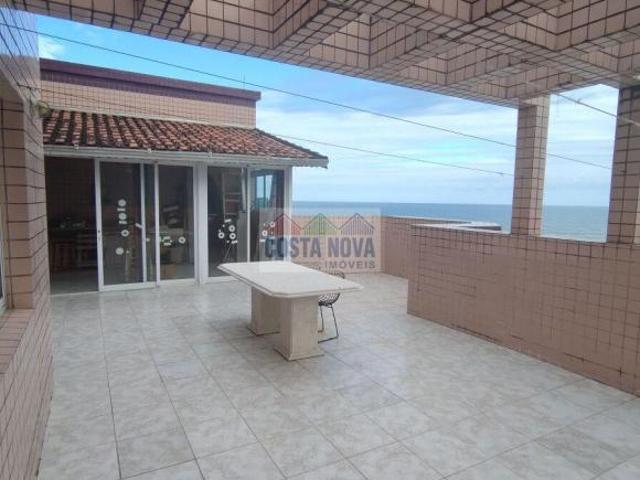 Cobertura prédio frente mar