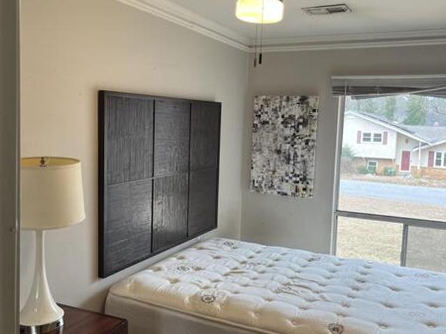 College Park bungalow in a quiet neighborhood, very close to MARTA and Old National!
