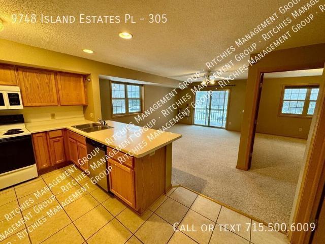 Corner 1 Bedroom – In Unit Laundry, Garage Parking & Balcony