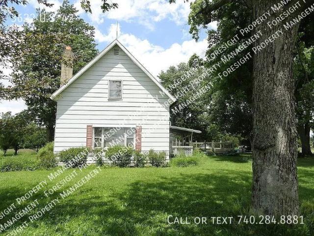 Country Living at Its Finest – Updated Farmhouse on 1.02 Acres