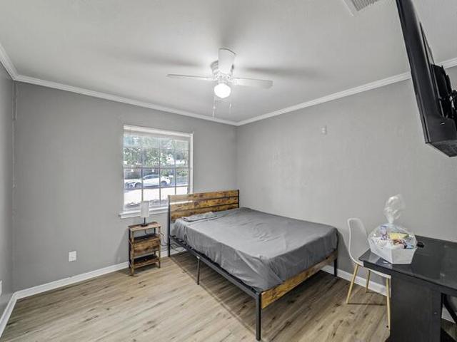 Cozy & newly renovated Dallas House with Patio each room has a work space and 50 inch TV