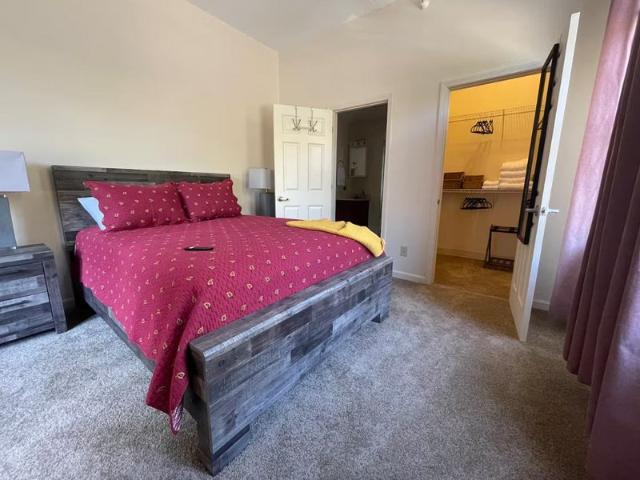 Cozy furnished bedroom with a private bathroom