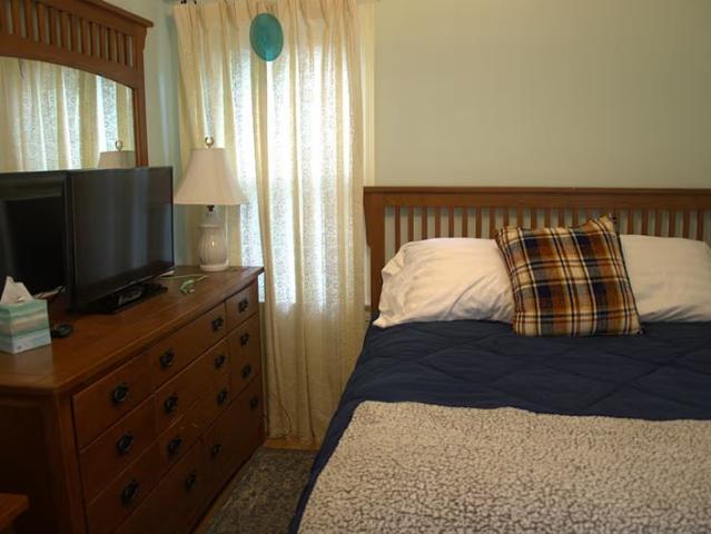 Cozy private bedroom with a private bathroom