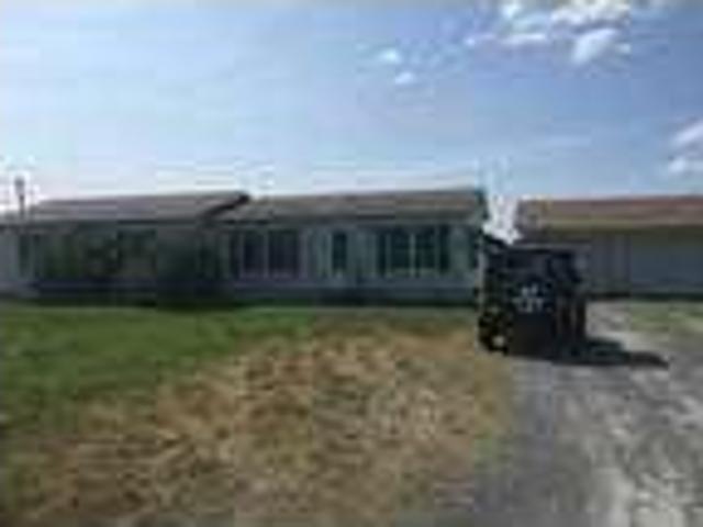 Cozy 3 bedroom 1.5 bath with 2 stall detached garage in country setting