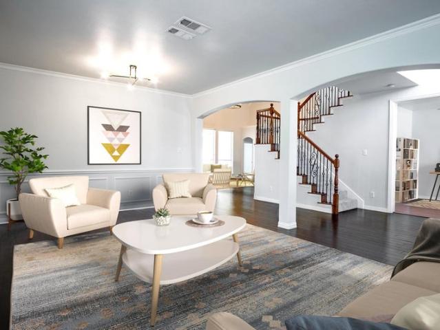 Classic Plano brick home with large fenced yard on