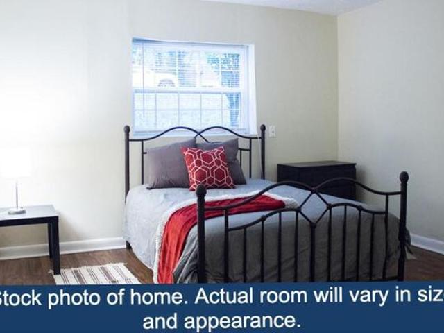 Clean & Bright Brick Candler McAfee Home | Furnished, Secure, and Spacious | No Move In Fee, Free Wi Fi, Monthly Cleanings, Bus Stop 1.3 Mile Away, and Grocery Store 0.9 Miles Away