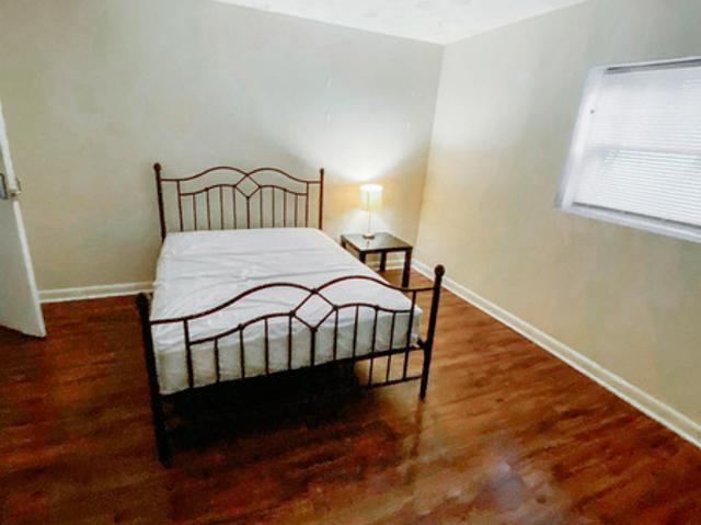 Clean & Bright Brick Candler McAfee Home | Furnished, Secure, and Spacious | No Move In Fee, Free Wi Fi, Monthly Cleanings, Bus Stop 1.3 Mile Away, and Grocery Store 0.9 Miles Away