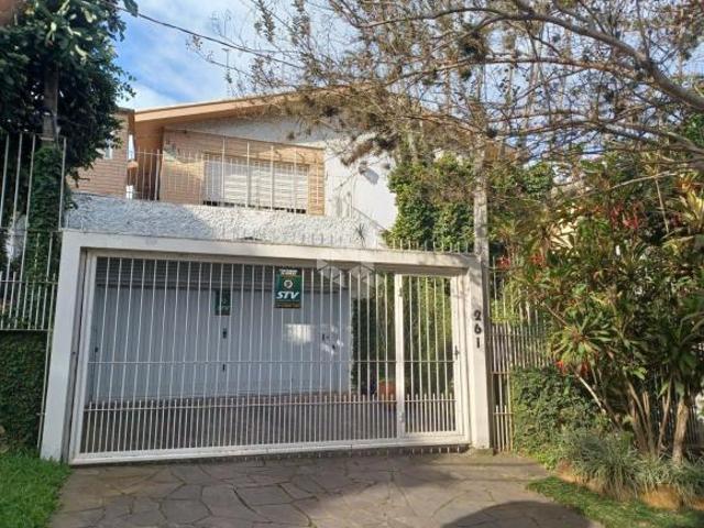 Credito Real Carlos Gomes Vende Casa 4 dormitórios/quartos, no bairro Chácara das Pedras Porto Alegr