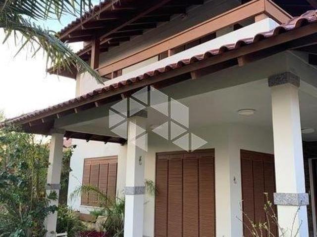 Crédito Real vende casa mansão de 5 quartos 2 suítes no centro da Praia de Tramandaí RS