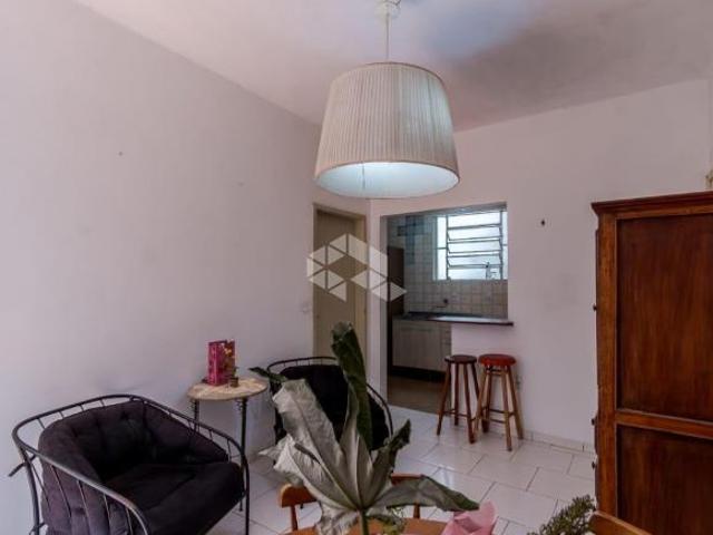 Credito Real vende apartamento térreo 1 dormitório com pátio no Bairro Auxiliadora em Porto Alegre