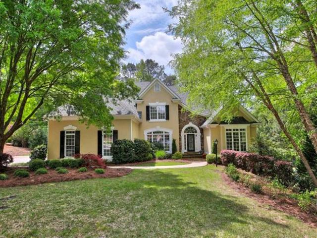 Custom Home In White Columns Has Indoor Pitching Bullpen!