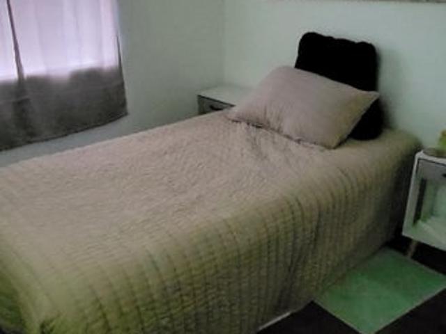 Cute small room with a twin size bed