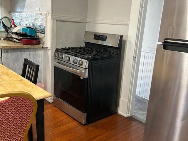 cute upstairs with gated parking lot