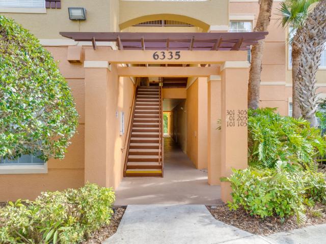 Cute 3/2 Condo in Horizons at Vista Lakes Gated with Updated Flooring and Front Parking Space