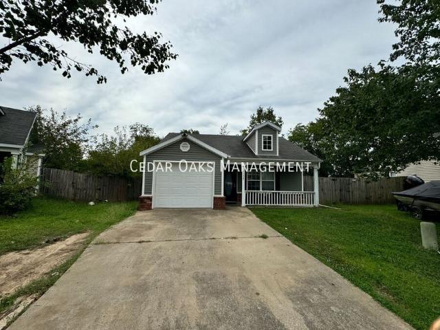 3 Bedroom Rogers Home with Fenced Yard and Garage at Veteran's Park