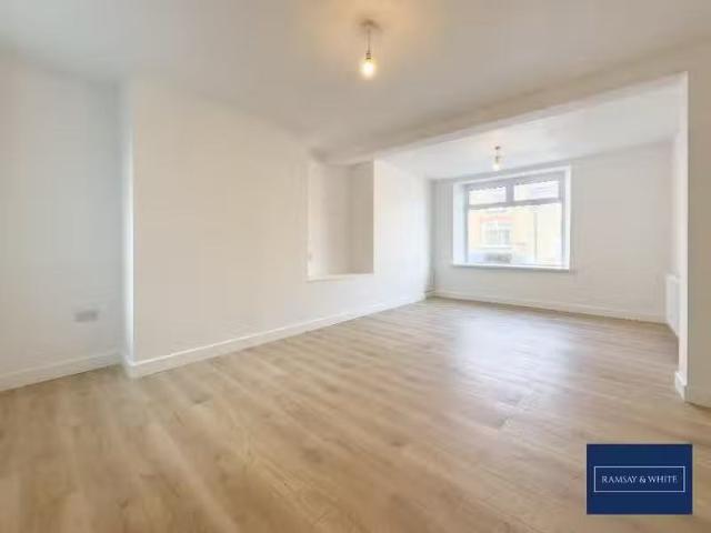 Charming 4 bedroom terraced house for rent in Gwernifor Street.