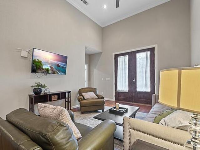 Delightful Grand Prairie home with a charming backyard