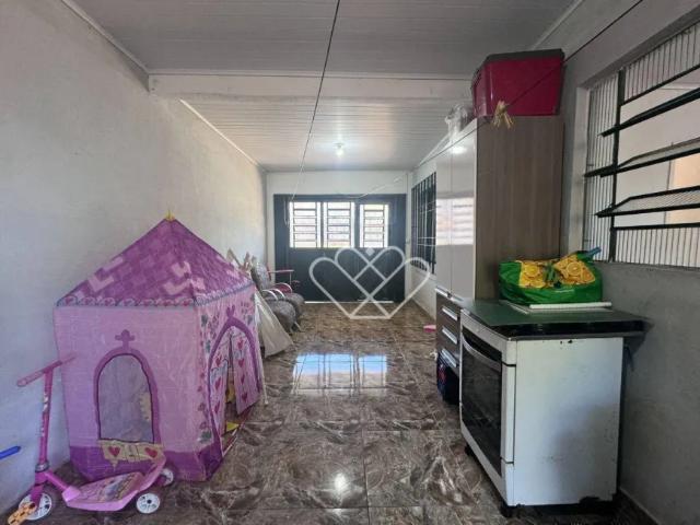 Descubra o conforto e a comodidade desta encantadora casa oferecida pela Brum Imob, localizada no tr