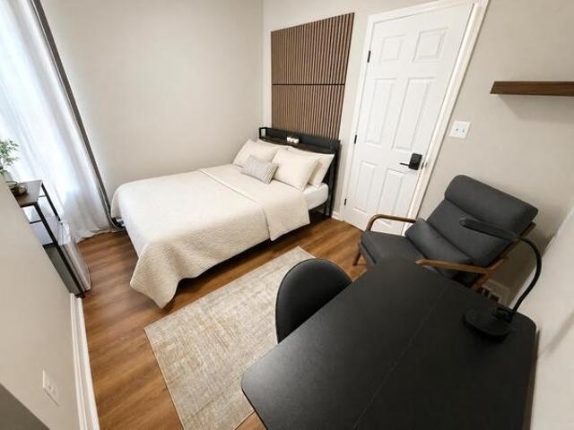 Designer Rowhome Acoustic Treated Rooms Mini Fridge & Coffee Machine in Every Room Quiet Backyard Central AC Smart Locks In Home Laundry Minutes to Hopkins & Downtown