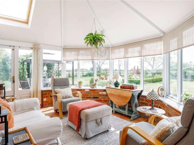 Detached family home set within delightful grounds adjoining farmland
