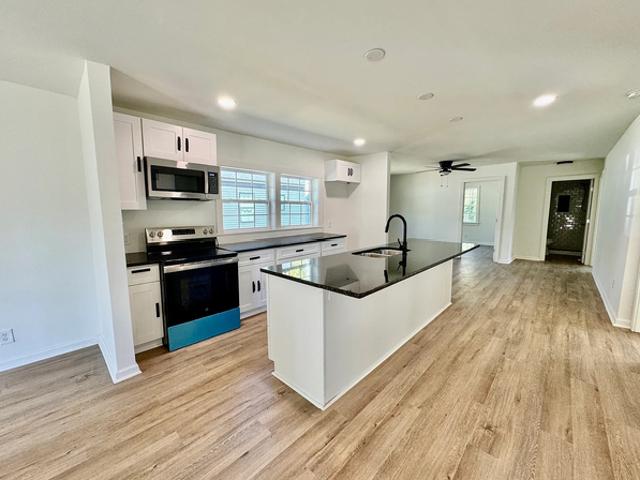 Discover this beautifully renovated sun filled rental home featuring brand new flooring, a modern granite kitchen with a huge center island perfect for entertaining and new soft close cabinets, stylish ceramic tiled showers and brand new systems.