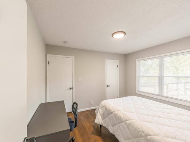 Discover this stylish home in Raytown, just minutes from 63rd St, Raytown Rd, major hospitals, employers like Hallmark and Cerner, and vibrant downtown Kansas City, all with easy access to I 70 and bus stops!