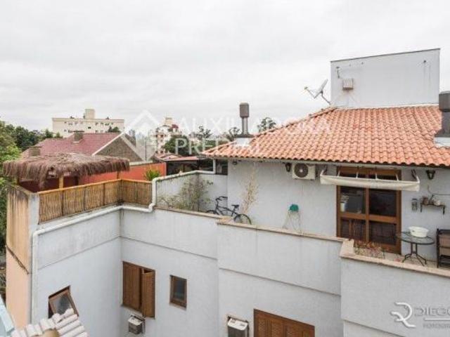 Dois dormitórios com suíte e garagem