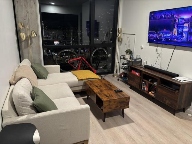 Downtown highrise — 1 room available June 8th
