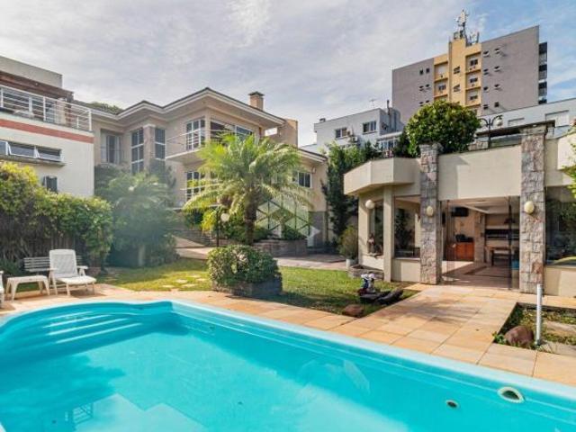 Duas Casas Moradia e Espaço Comercial integrados em Patio com 1000m² em 2 terrenos