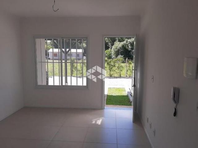Duplex SEMIMOBILIADO no coração do Arroio Grande