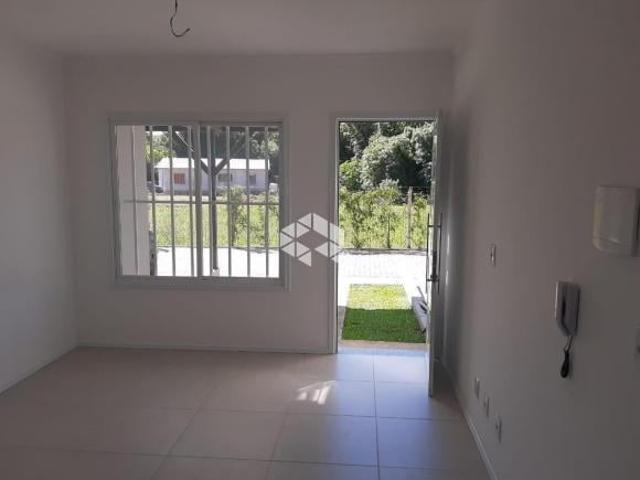 Duplex SEMIMOBILIADO no coração do Arroio Grande