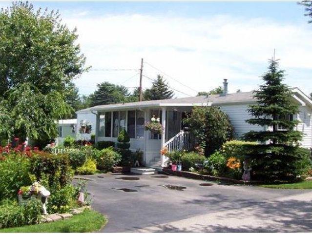 E 11 303 OLD LAKESHORE ROAD Gilford