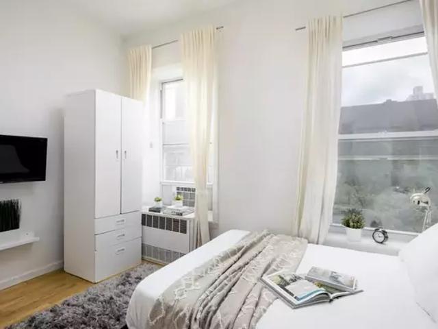 E 59th St #369
