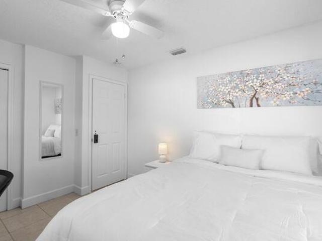 EARN FREE WEEKRemodeled, Spacious, Safe Home in SANFORD Minutes walk to bus Minutes to I 4 Highway FREE 1GB WiFi, Utilities, Laundry, Parking Cleaning Each Room Has: Mini Fridge, TV, Closet w/ Drawers, Desk & Chair
