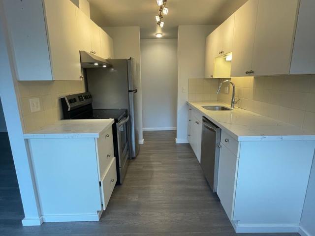 Elikai 306 Spacious TOP Floor, 1x1, w/ Private Balcony ~ Designer finishes + W/D in Unit!