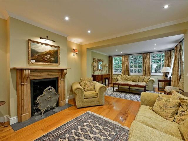 Elegant five bedroom Georgian home with gated privacy, landscaped gardens, and self contained annexe