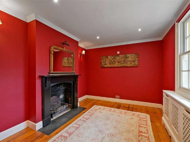 Elegant five bedroom Georgian home with gated privacy, landscaped gardens, and self contained annexe