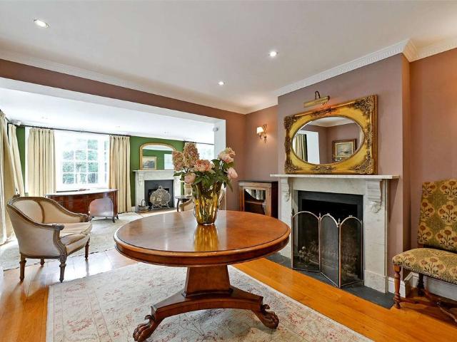 Elegant five bedroom Georgian home with gated privacy, landscaped gardens, and self contained annexe