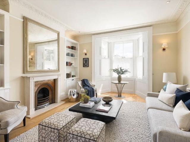 Elegant five bedroom period family home with a mature garden set over four floors