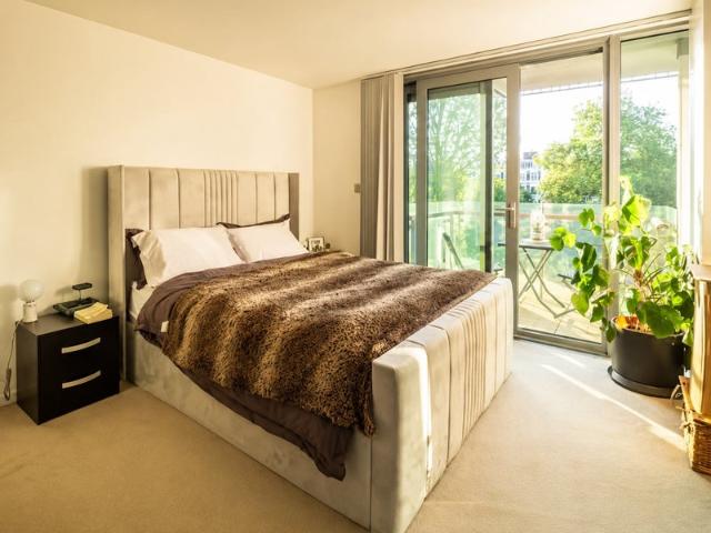 Elegant 1BR Apartment Overlooking a Green Square