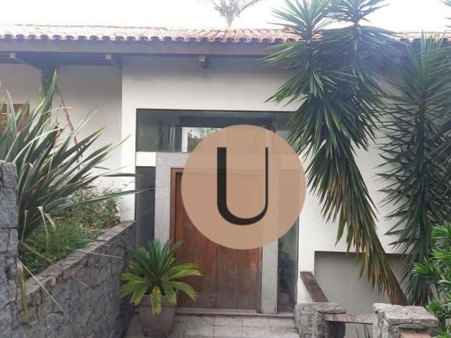 Elegância e Lazer Absoluto no Jardim Guedala – 800m² com Quadra de Tênis