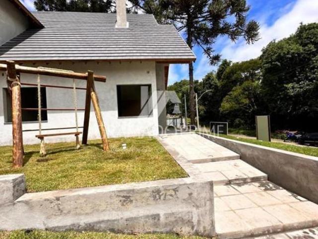 ENCANTADORA CASA EM CONDOMÍNIO HORIZONTAL