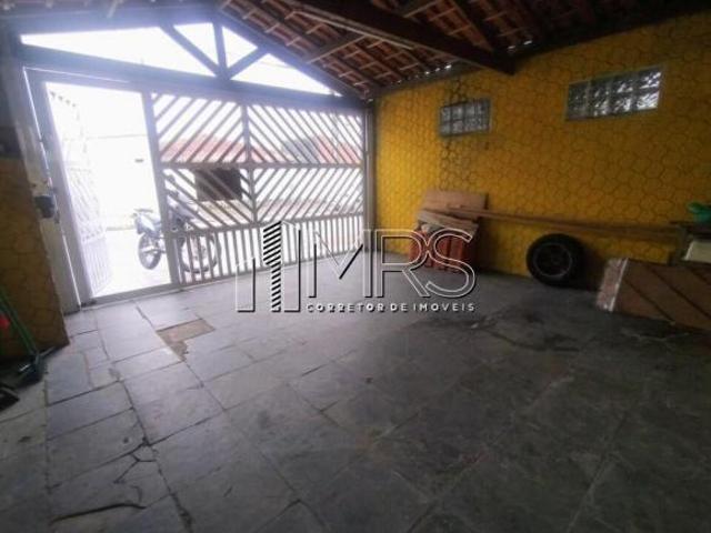 Espaçosa Casa à Venda em Melvi, Praia Grande 2 Quartos, 2 Vagas