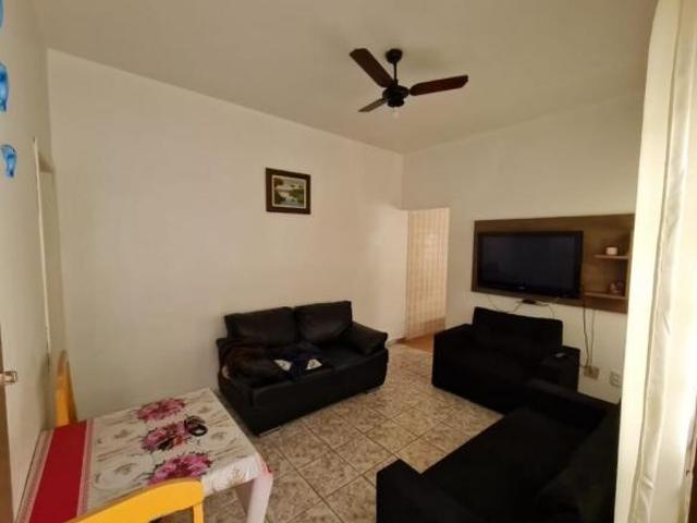 Espaçosa Casa Geminada à Venda em Caiçara, Praia Grande 2 Quartos