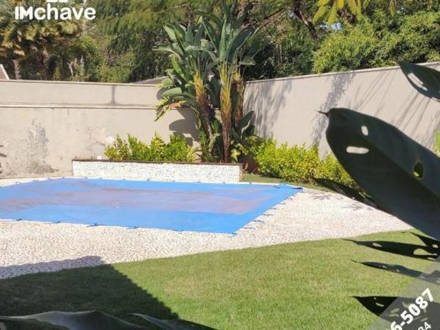 Espetacular Casa no Condomínio Flamboyant Completa com 5 dormitórios, piscina grande e Condomínio Ex