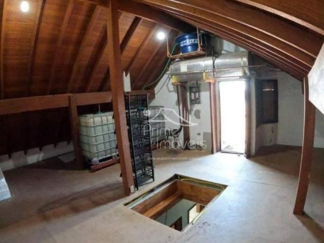 Espetacular Casa de Alto Padrão no Condomínio Arujá Ville 1 – Vista para a Mata e Sustentabilidade