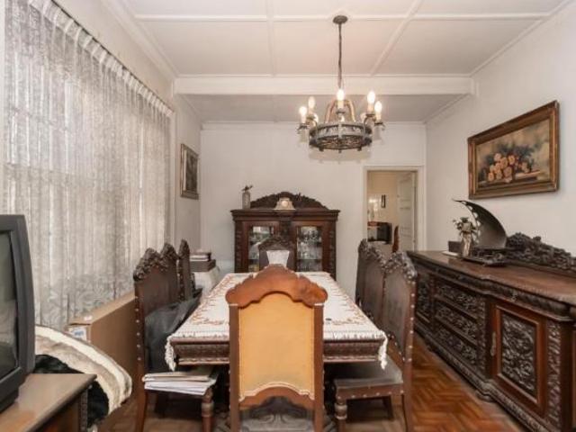 Aconchegante casa para venda em Jardim América com 3 quartos, sendo 1 suíte, 200m²