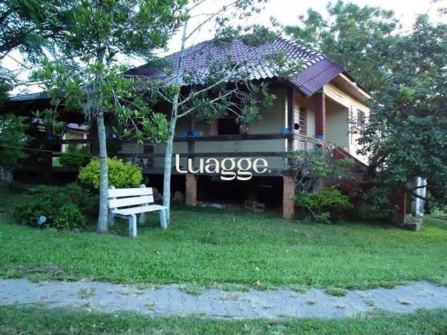 Espetacular Sitio com Tres Casas sendo uma de 500m2 de tijolos a vista e duas de